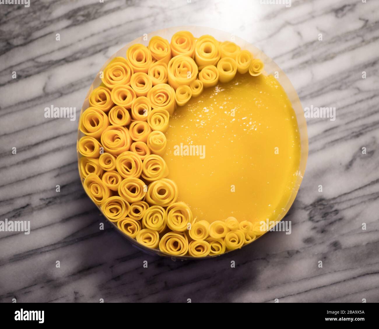 Mango Cheesecake with Mango Glaze and Mango Roses Stock Photo - Alamy