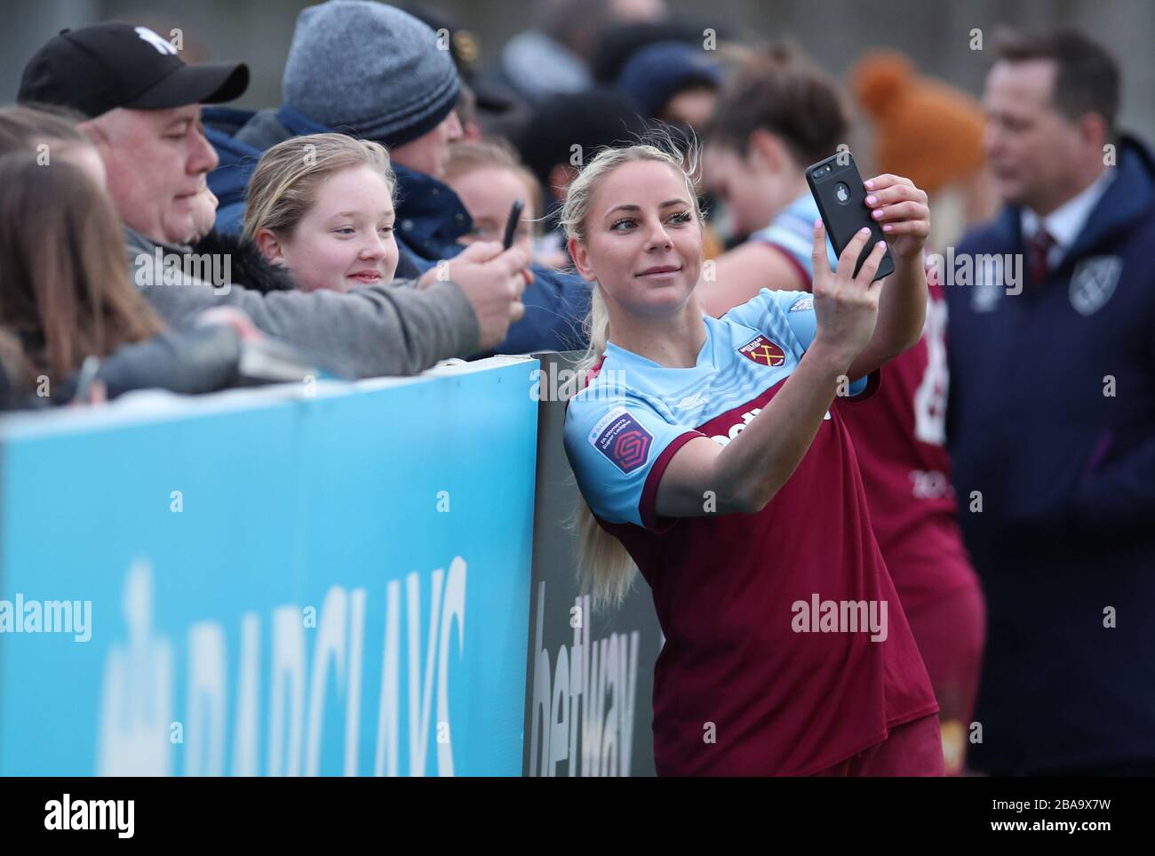 West Ham United's Adriana Leon takes a selfie with the fans following ...