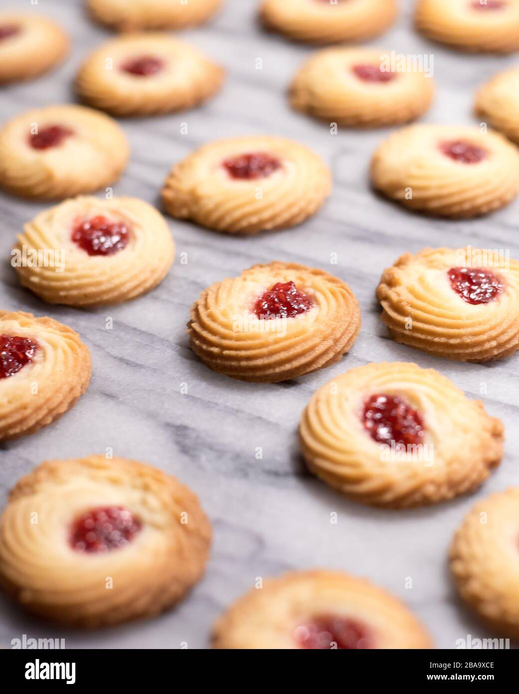Raspberry Swirl Shortbread Cookies on a Marble Pastry Board Stock Photo ...