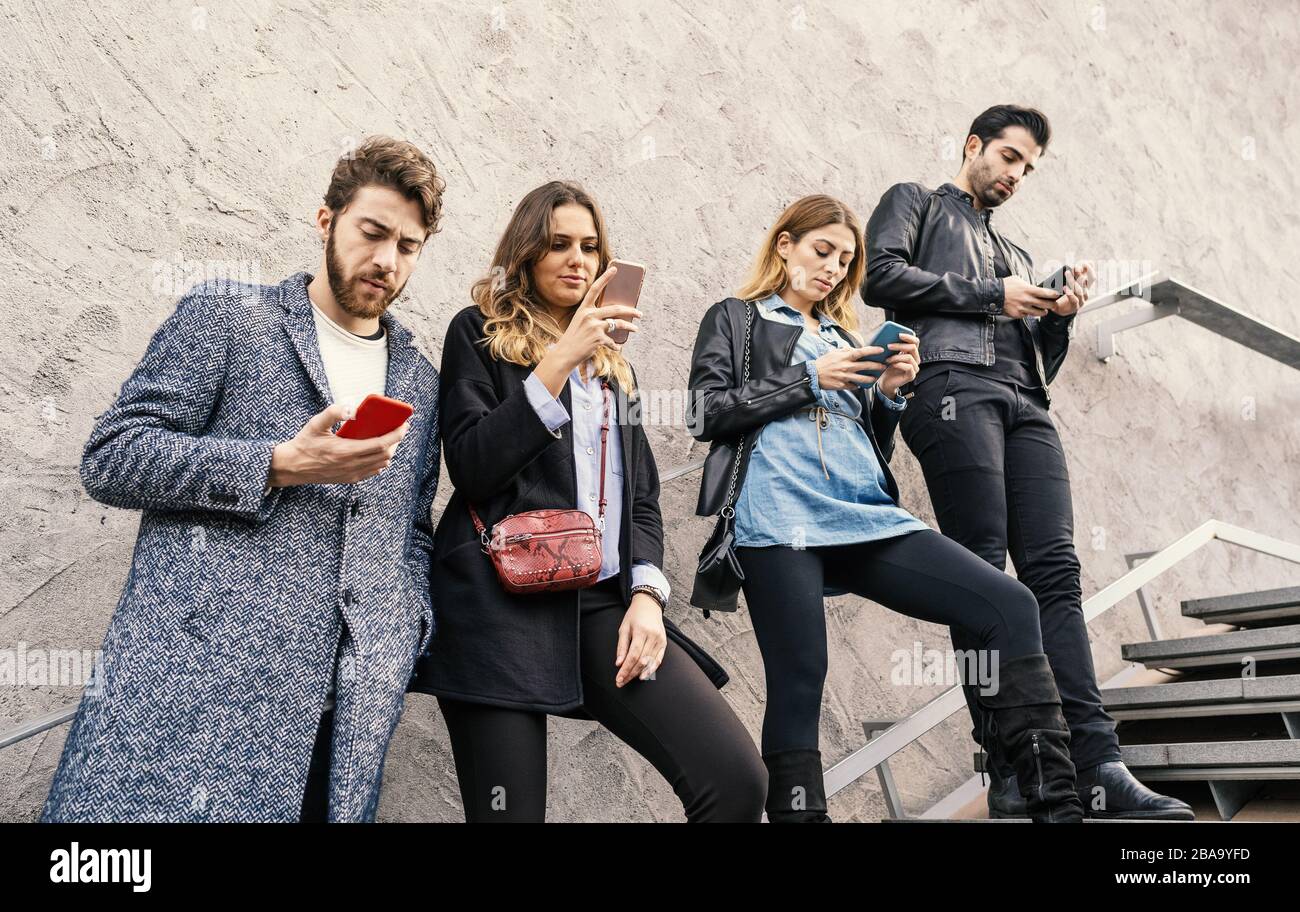 Millennials generation smartphone addiction concept. Group of people ...