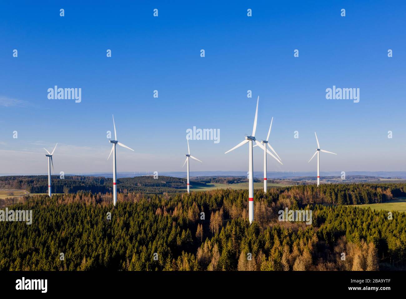 Wind wheels in the evening light hi-res stock photography and images ...