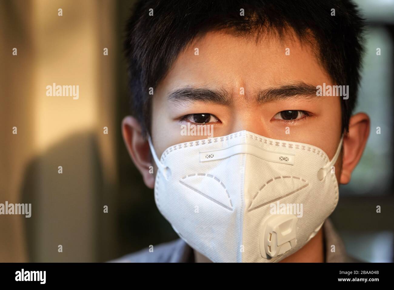 Wearing a mask of boy image features Stock Photo - Alamy