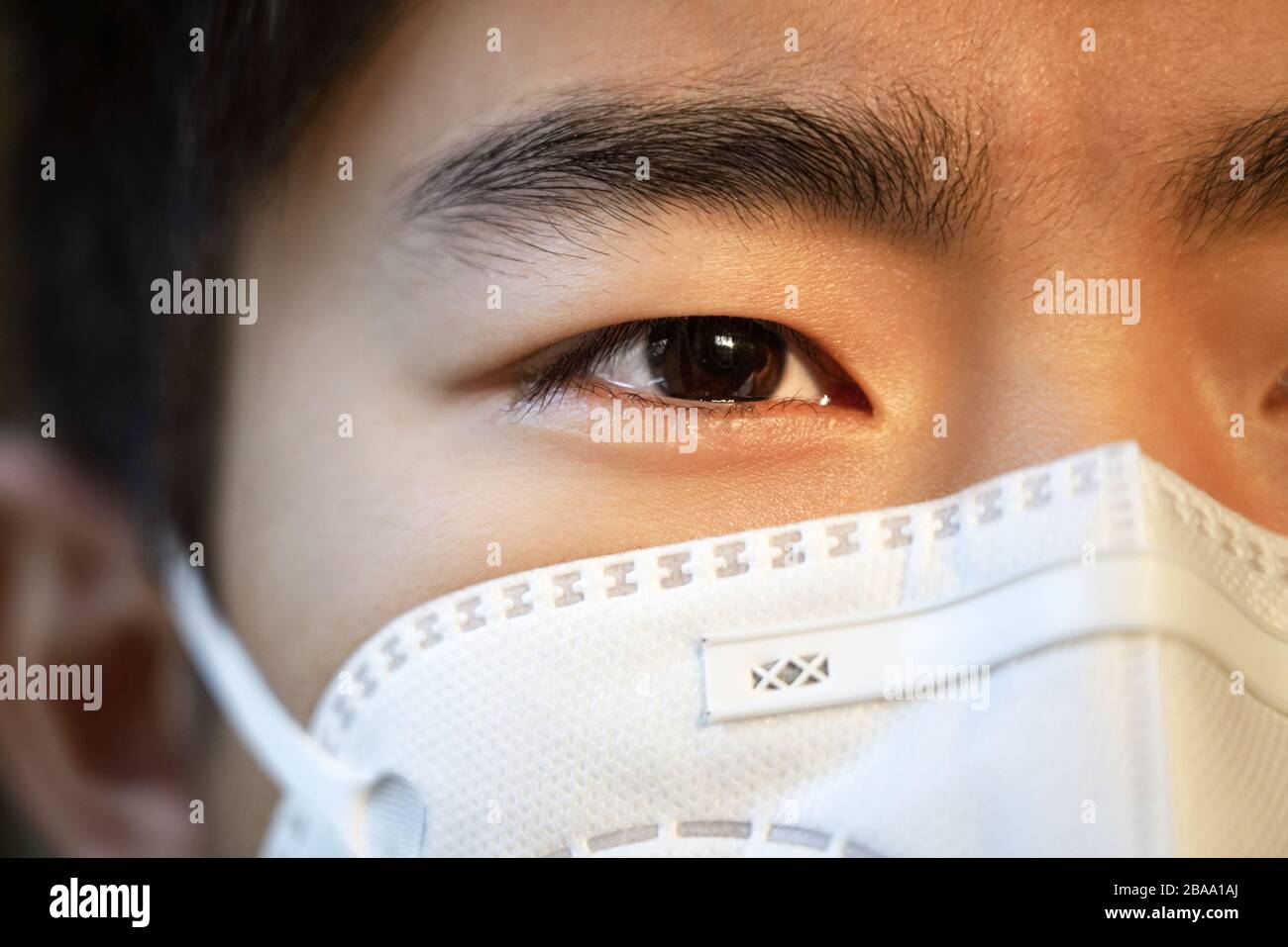 Wearing a mask of boy image features Stock Photo - Alamy