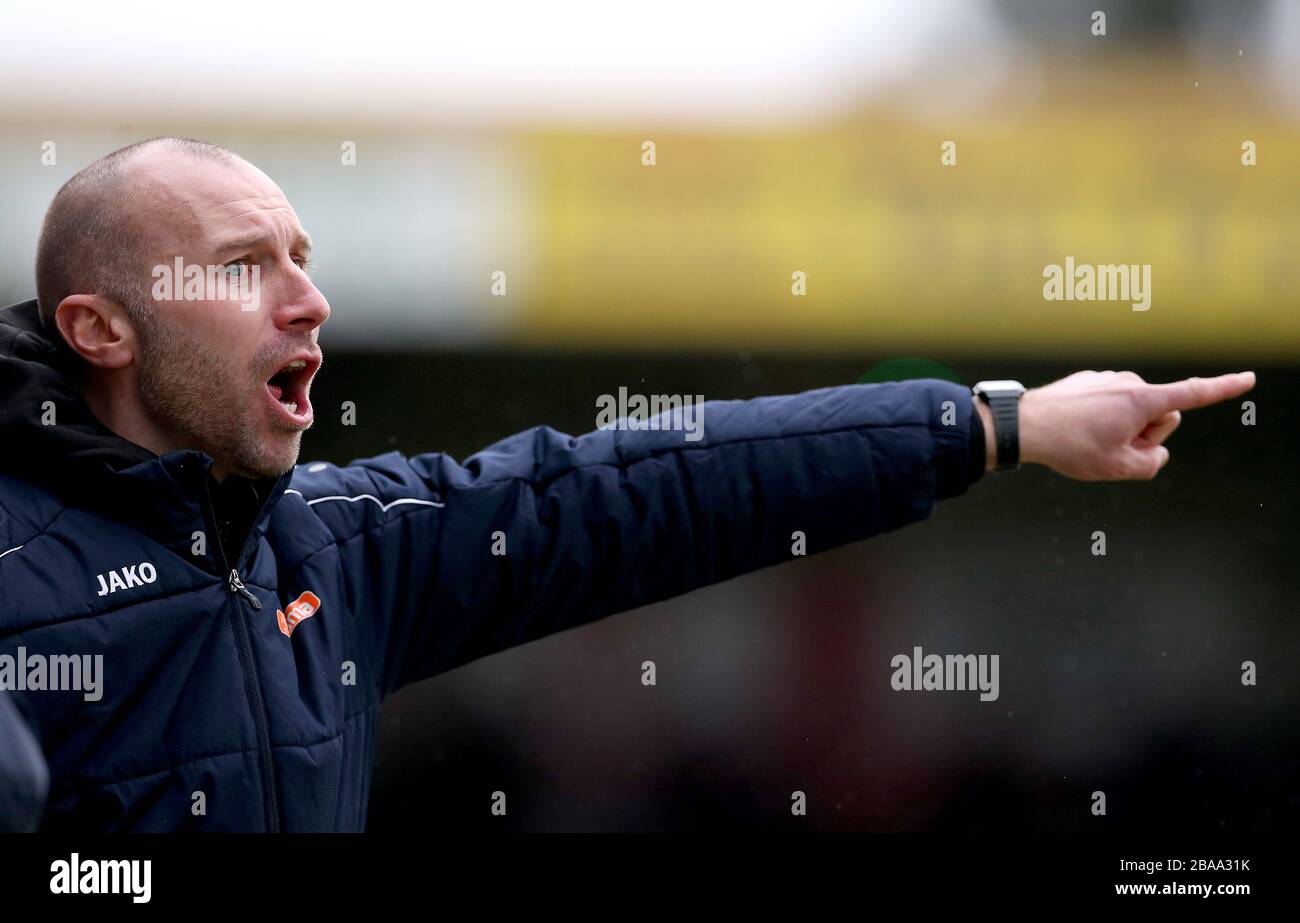 Kidderminster Harriers' manager Russ Penn gestures on the touchline ...