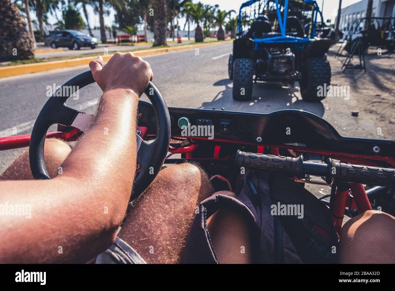 Riding a dune buggy front view Stock Photo - Alamy
