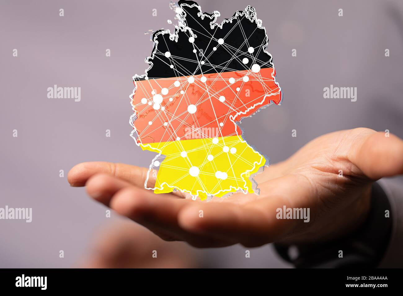 A germany map digital in hand 3d Stock Photo - Alamy
