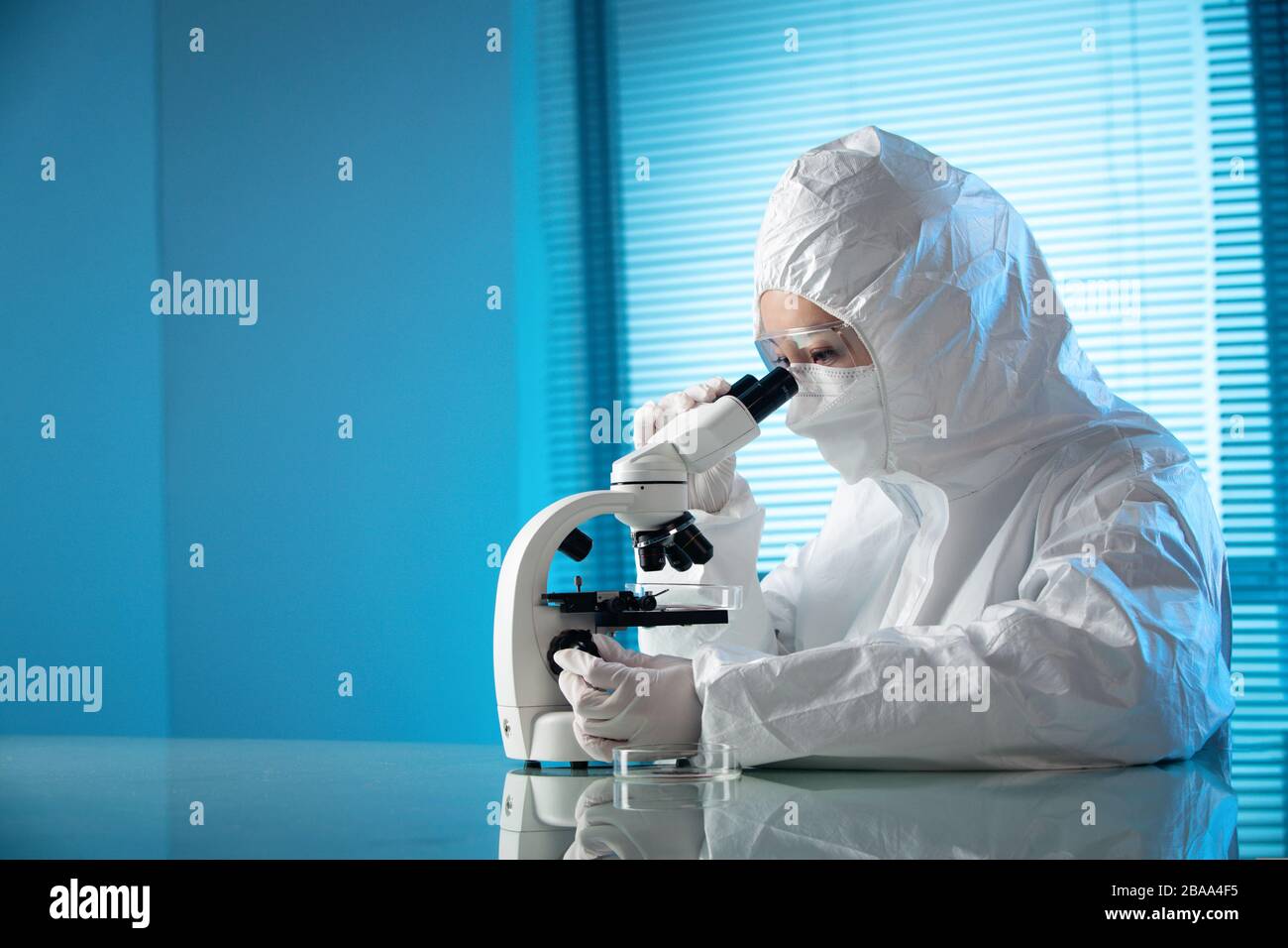 Indian doctor with microscope hi-res stock photography and images - Alamy