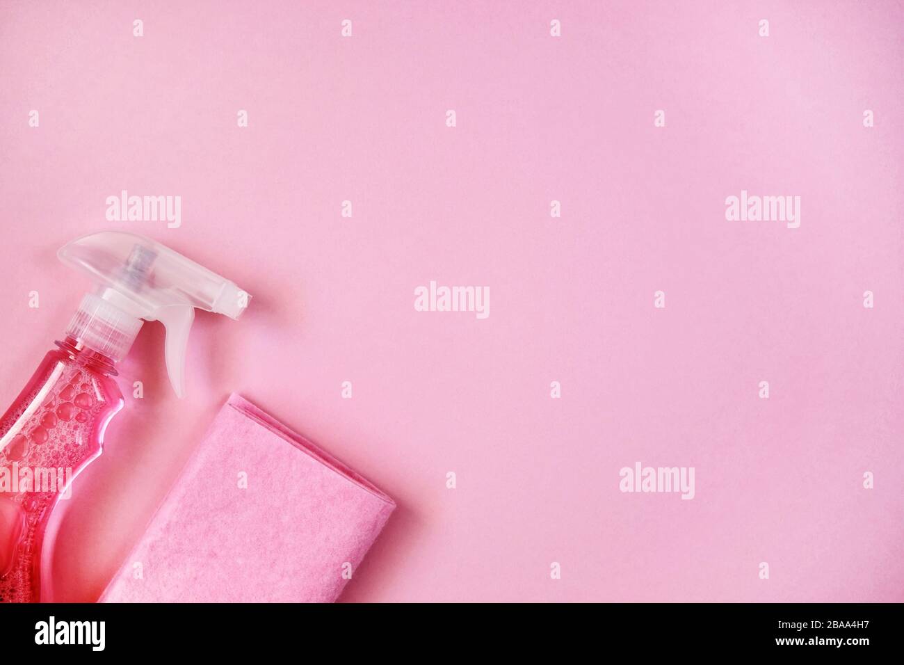 Detergents in spray. Сleaning accessories. Top view of pink cleaning ...