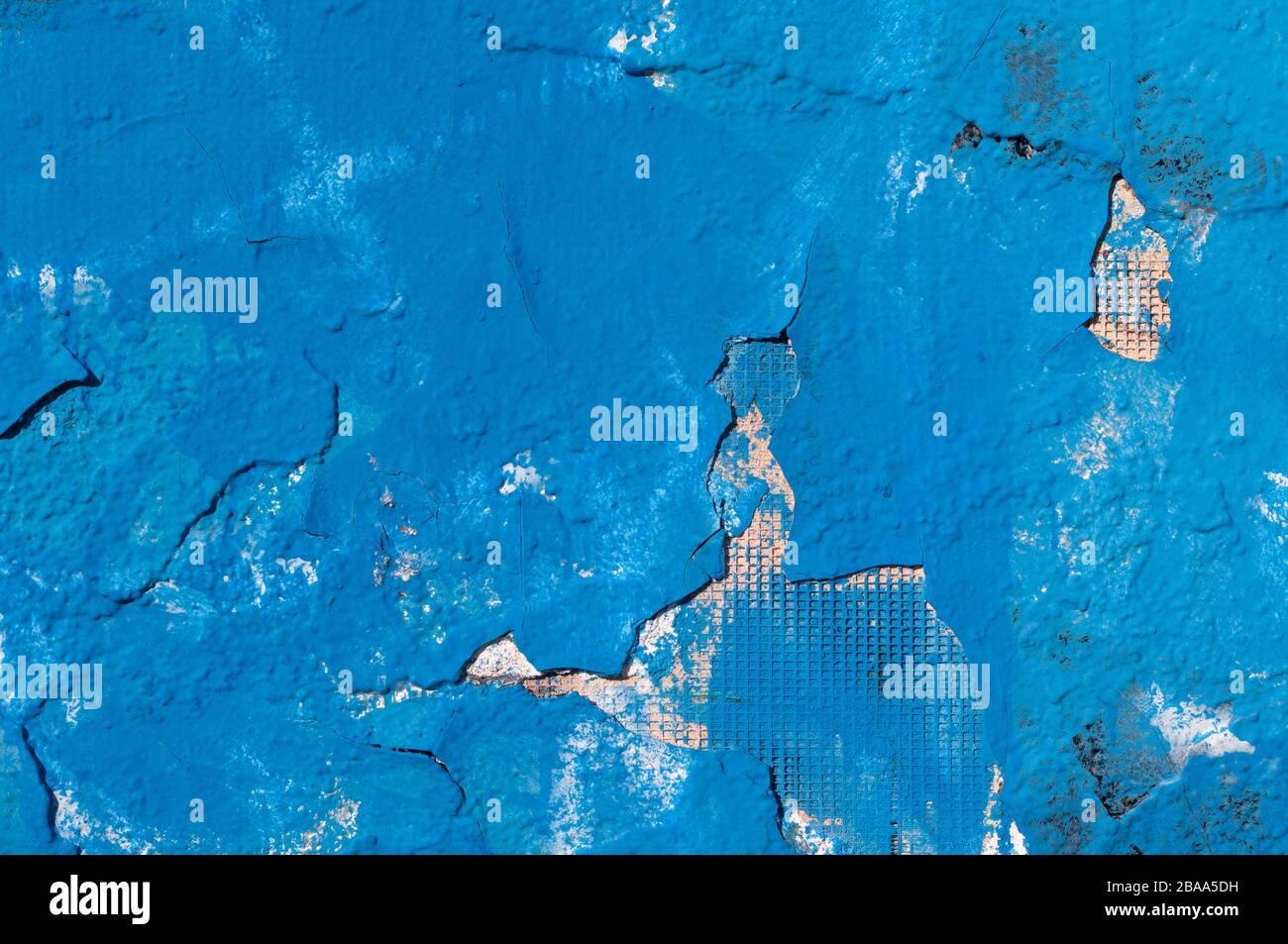 broken plaster at a weathered wall with visible supporting tissue Stock ...