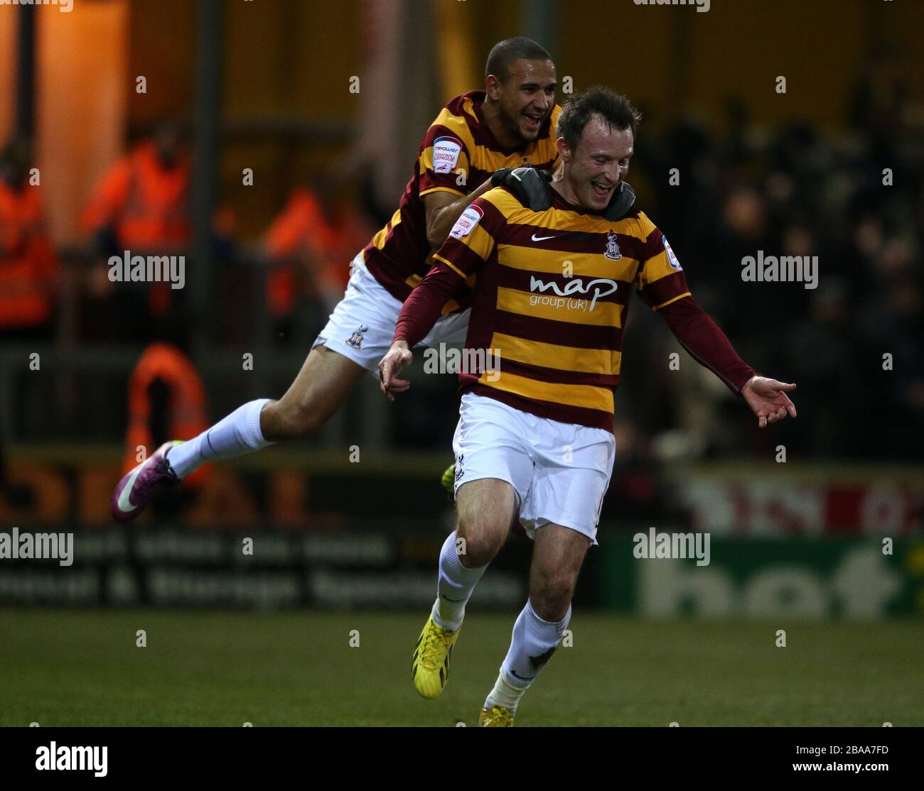 Bradford City's Garry Thompson (front) celebrates with his team-mate ...