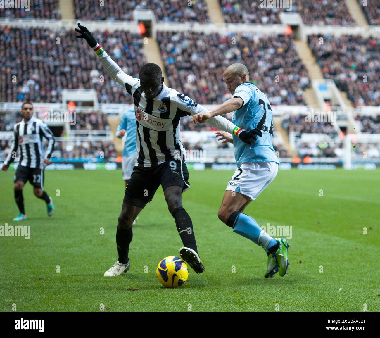 Newcastle United's Papiss Demba Cisse (left) and Manchester City's Ga‘l ...