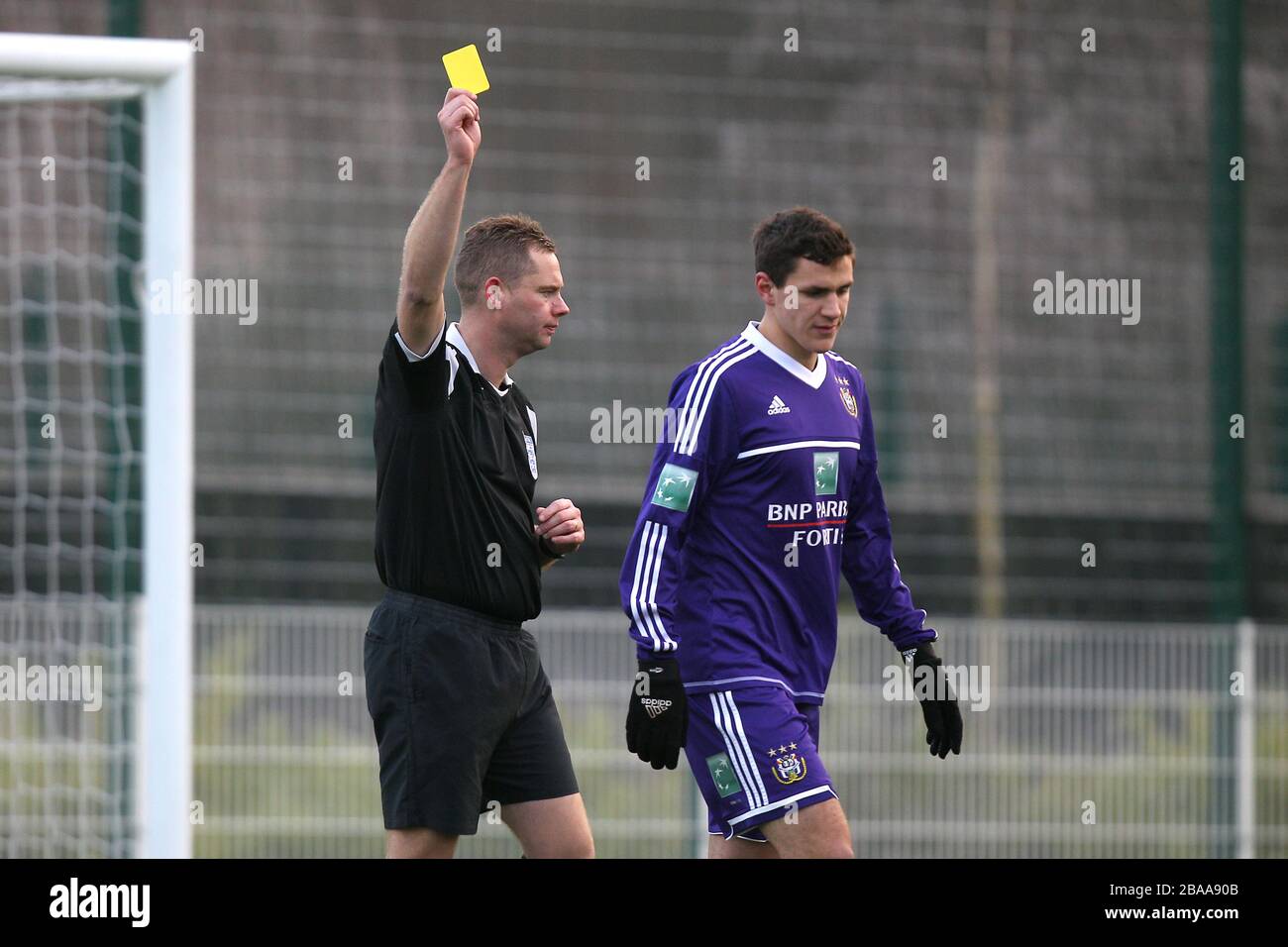 Referee Rob Whitton books Anderlecht's Sebastian De Wilde (right Stock ...