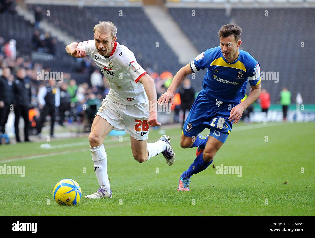 Milton Keynes Dons Luke Chadwick (left) and AFC Wimbledon's Steven ...