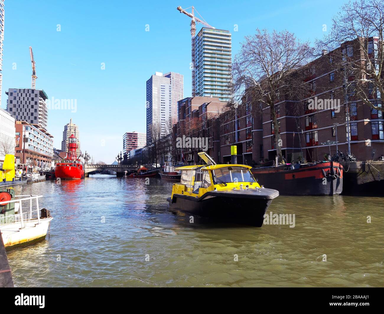 river traffic of boats between the waters of the canals of rotterdam in ...