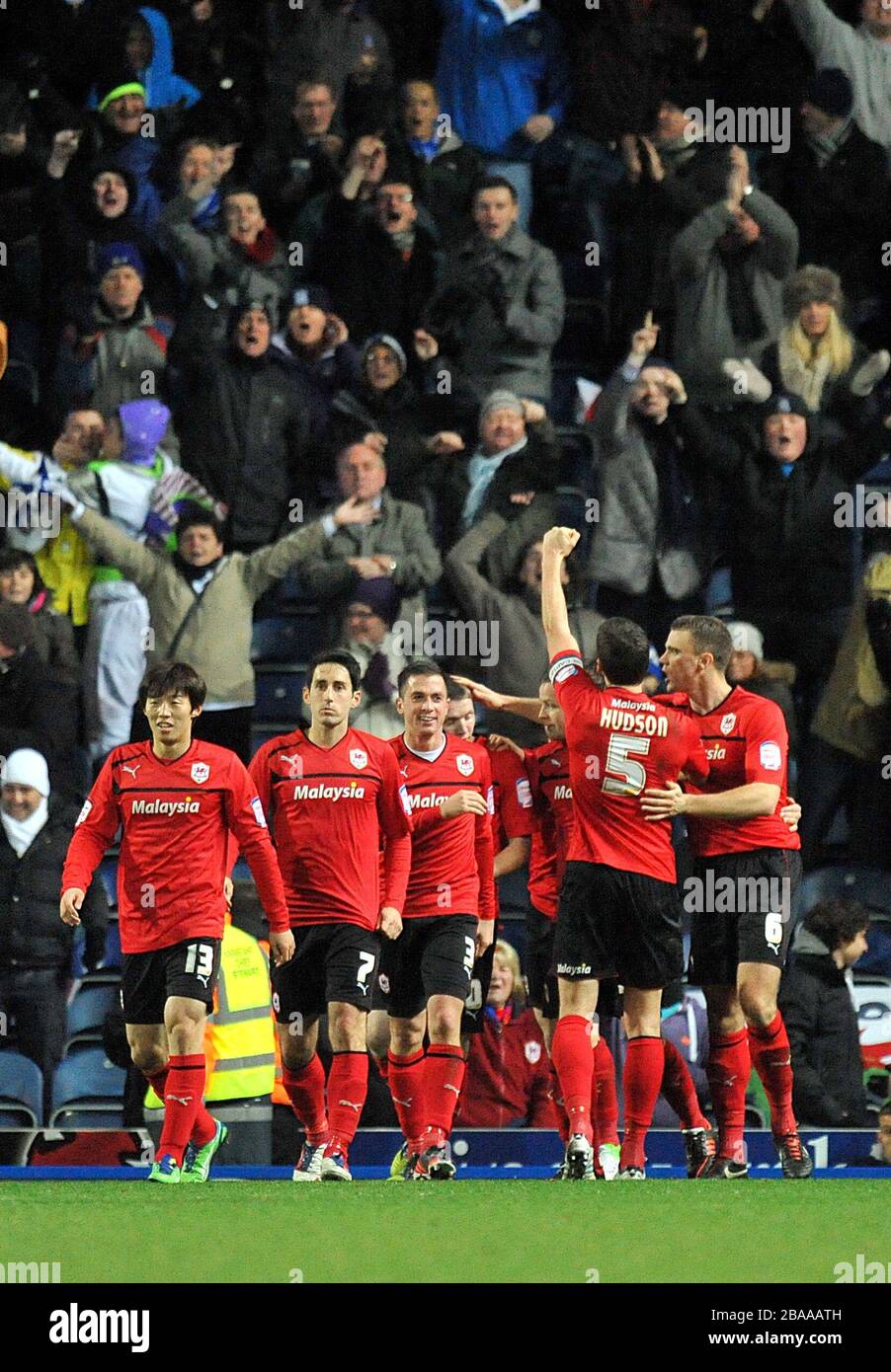 Cardiff City's Joe Mason (centre) celebrates scoring their third goal ...