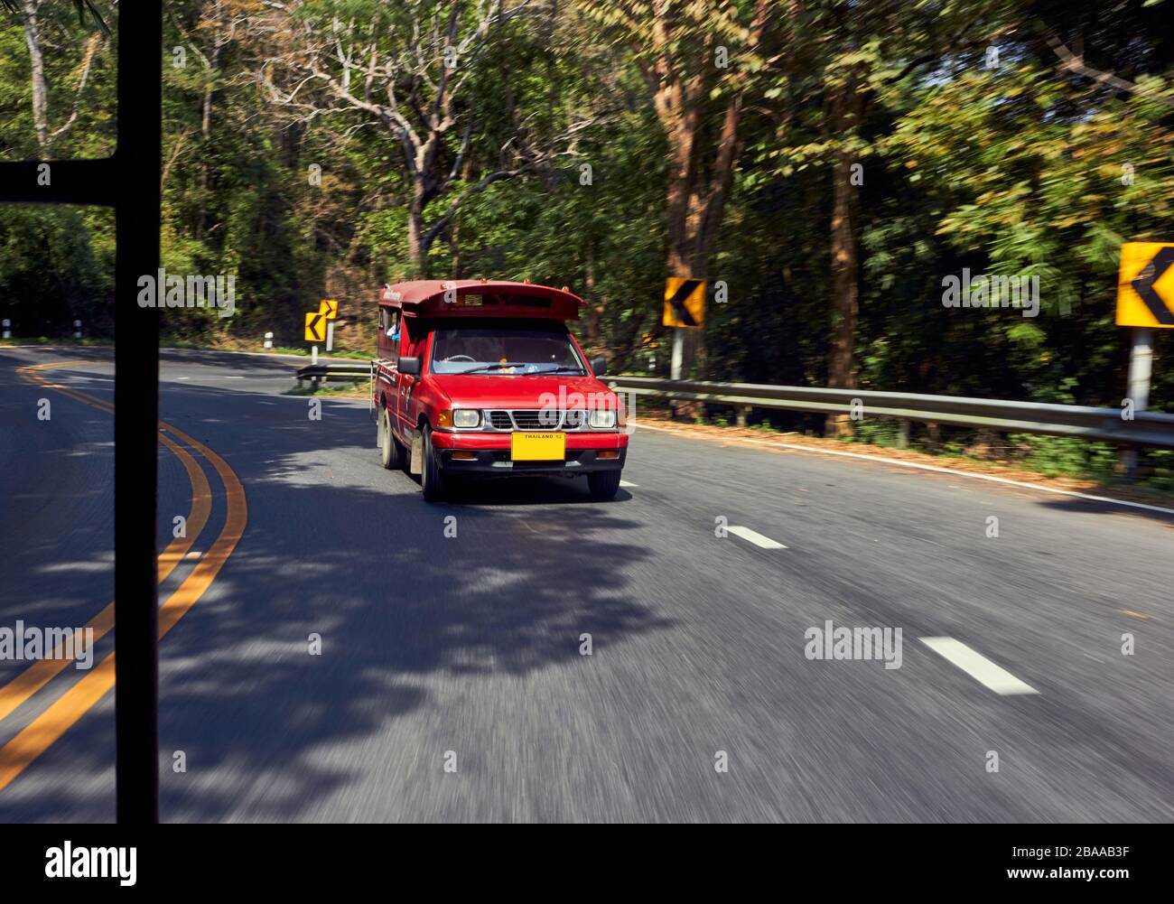 Red taxi car panning in Chiang Mai Stock Photo - Alamy