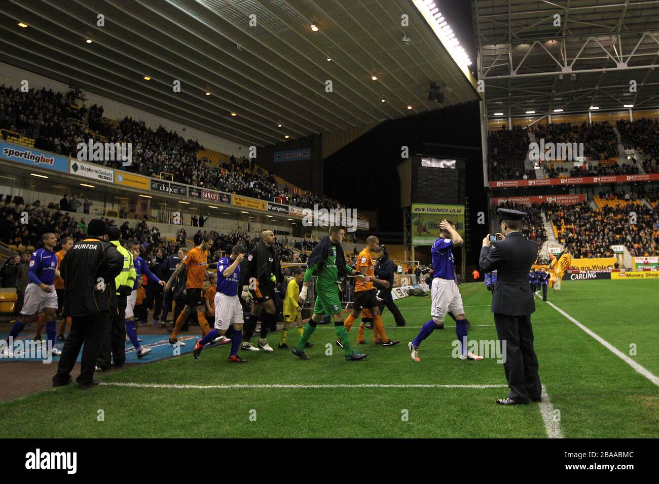 Wolverhampton Wanderers and Birmingham City players emerge from the ...