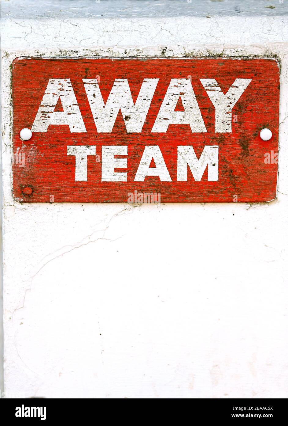 Away team dugout signage at the City Ground Stock Photo - Alamy