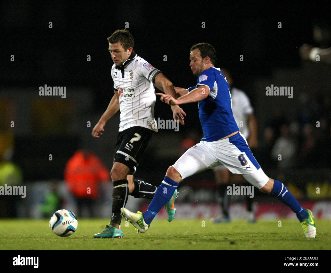 Port Vale's Doug Loft and Chesterfield's Sam Togwell (right) battle for ...