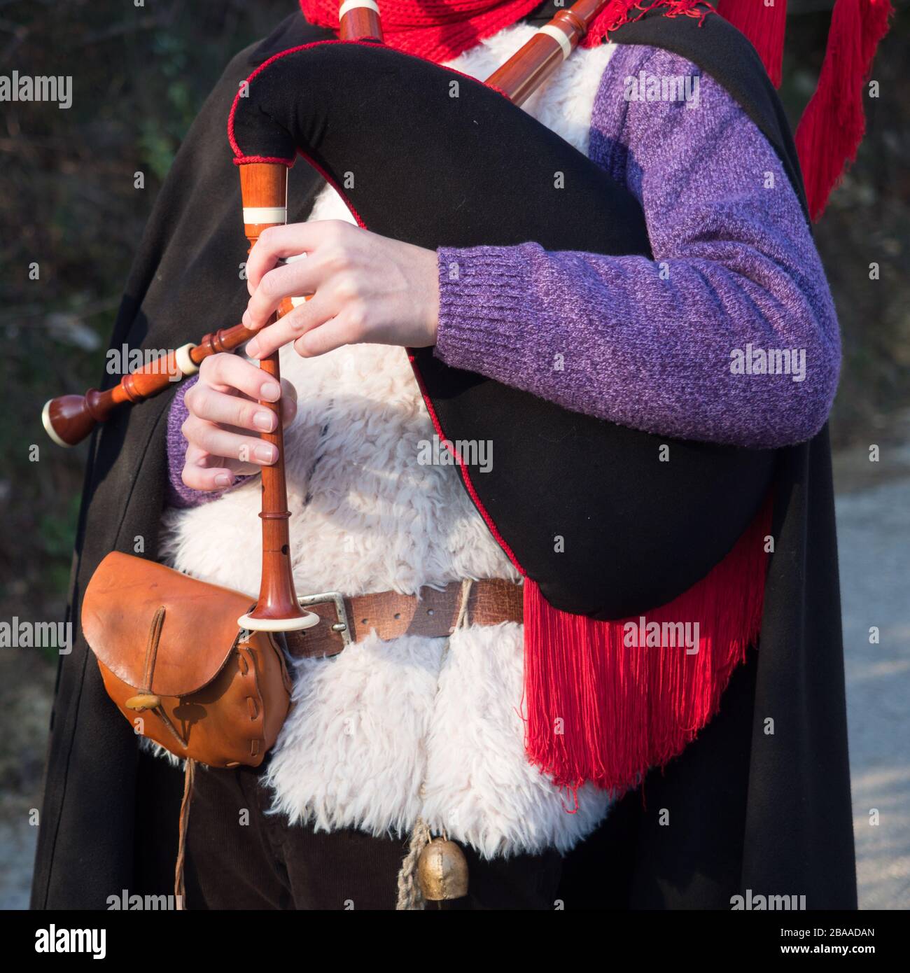Bagpipe player in gowns during a traditional festival Stock Photo - Alamy