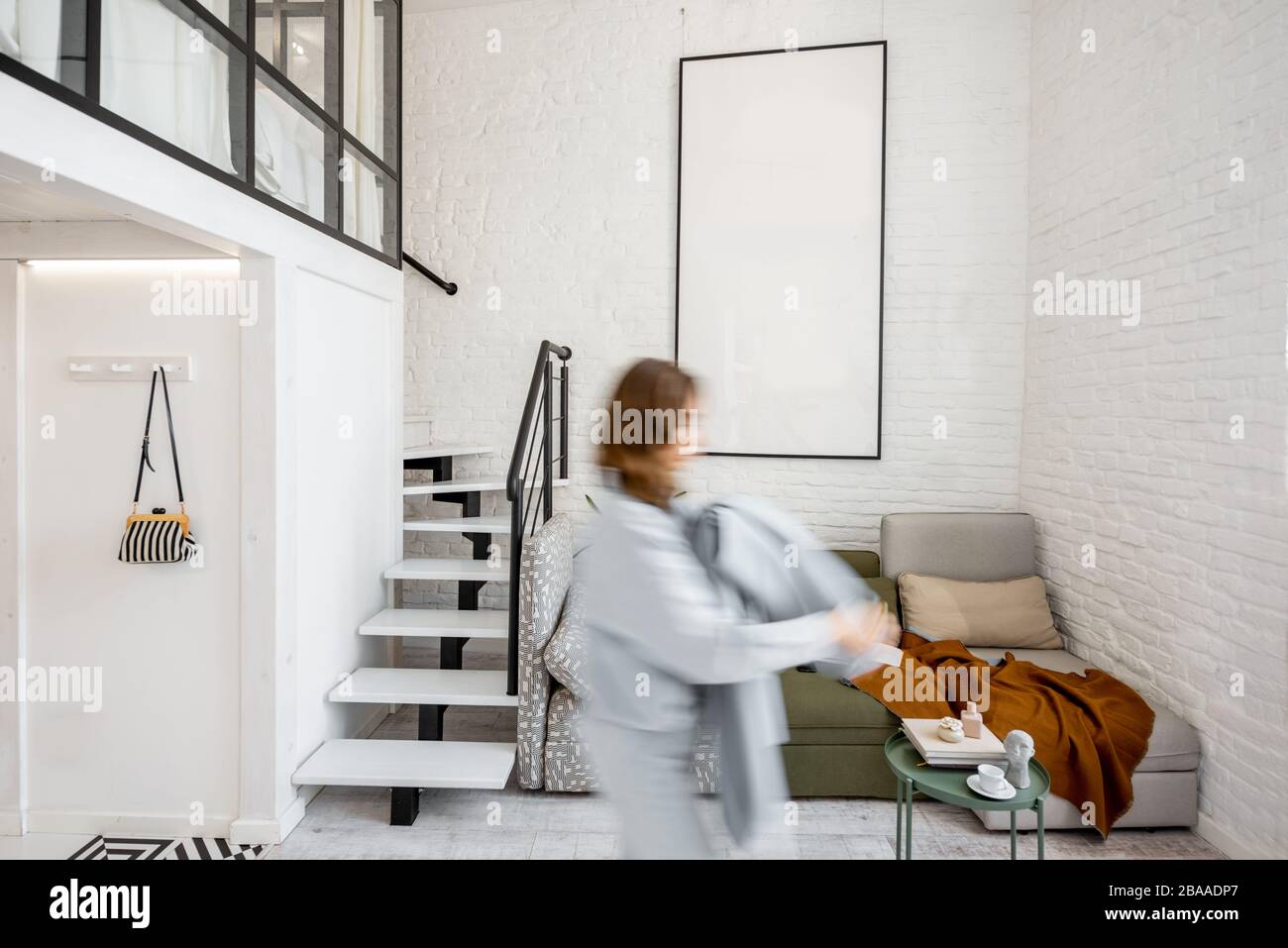Interior view of the bright modern living room with a blurred in motion ...