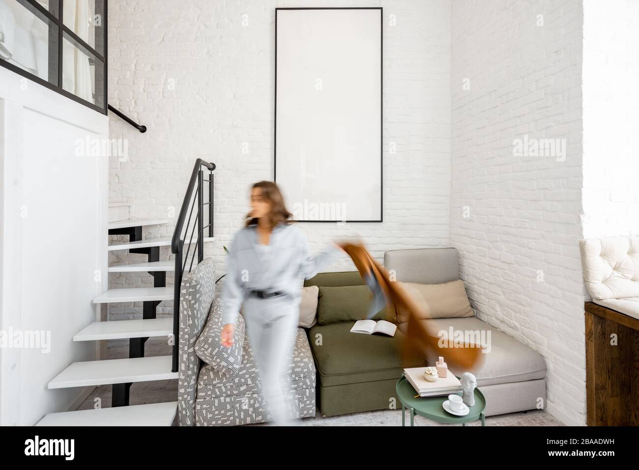 Interior view of the bright modern living room with a blurred in motion ...