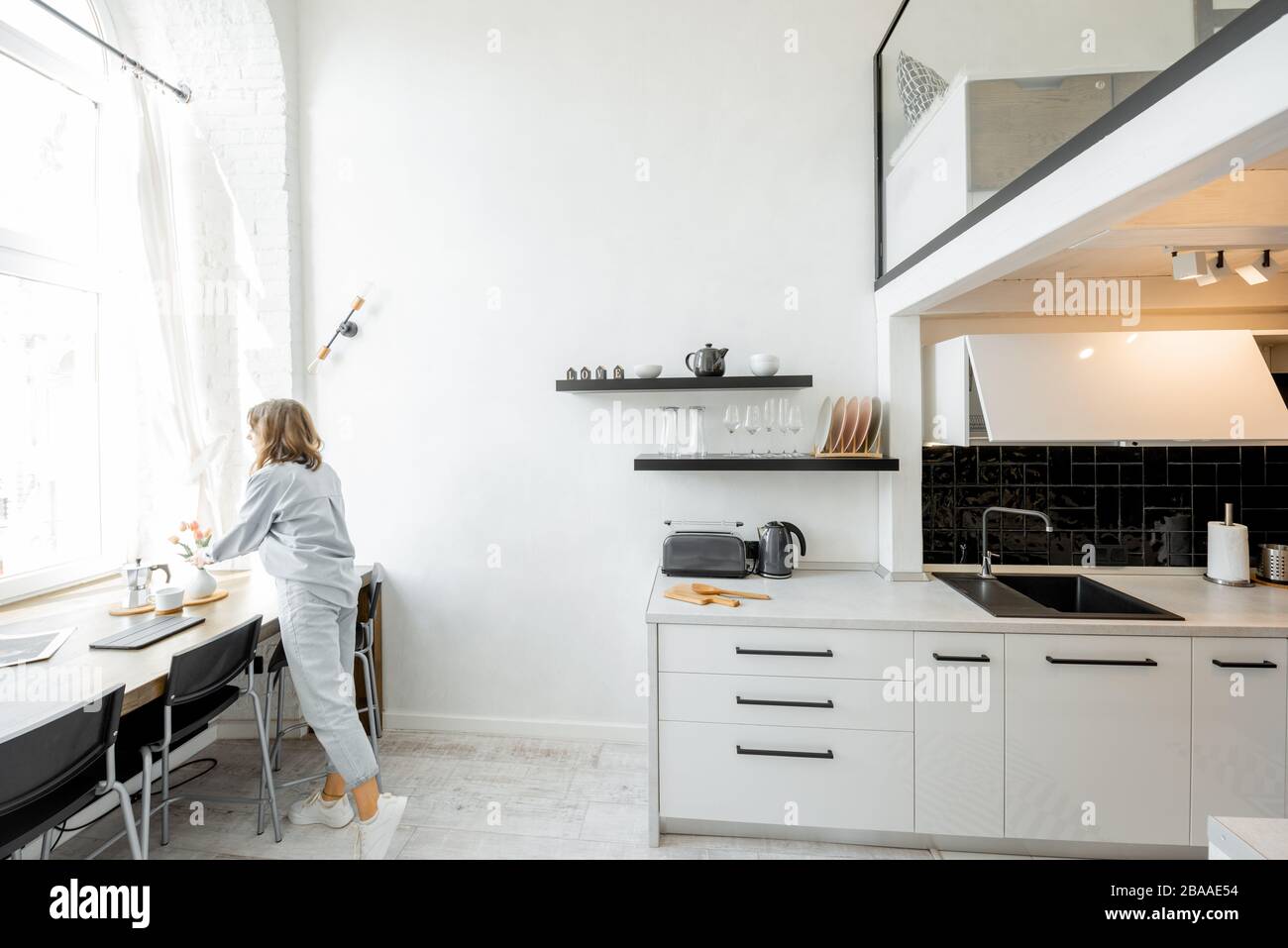 Interior view of the bright and modern kitchen with a blurred in motion ...