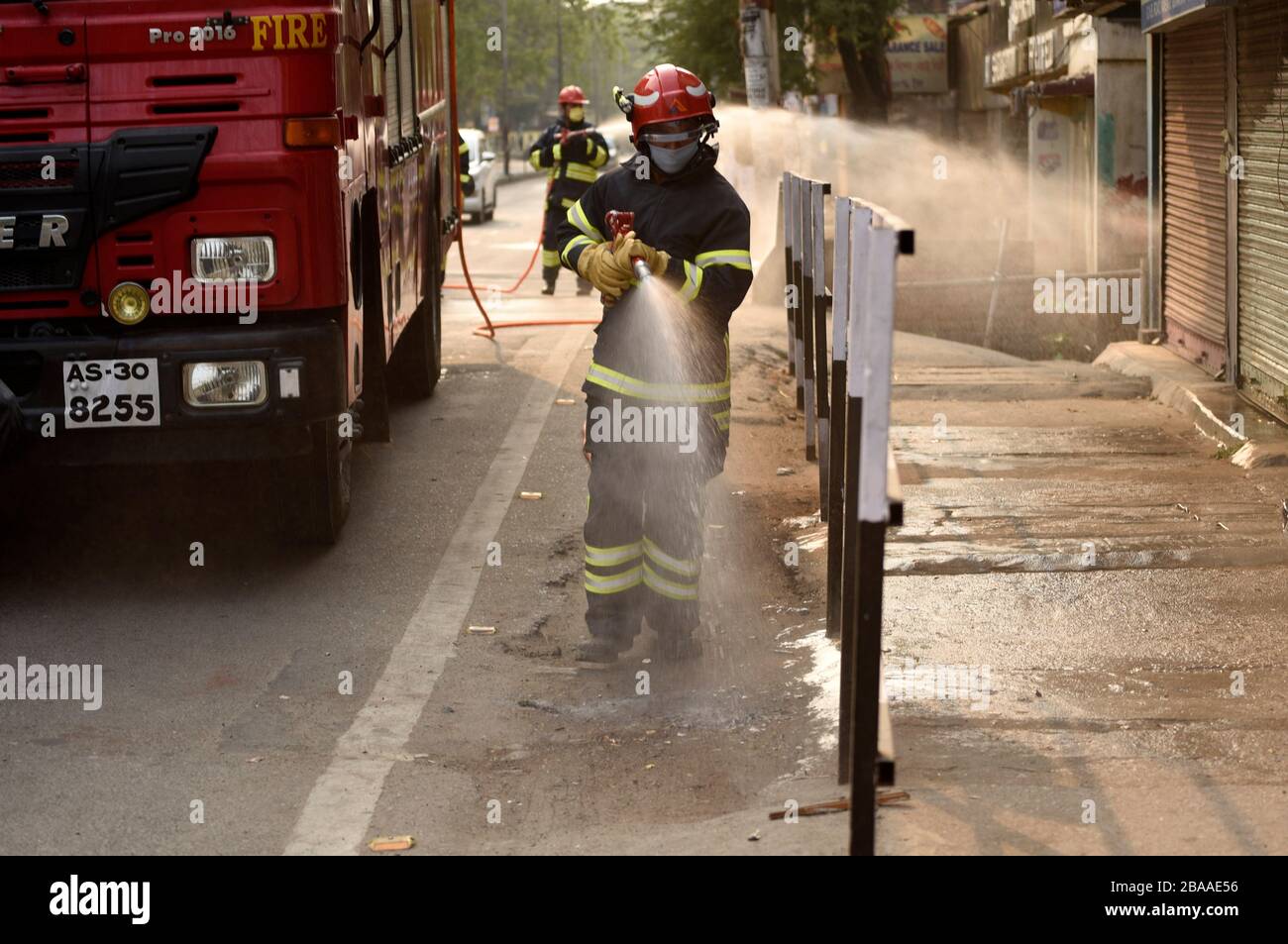 Firefighter sprays disinfectant hi-res stock photography and images - Alamy