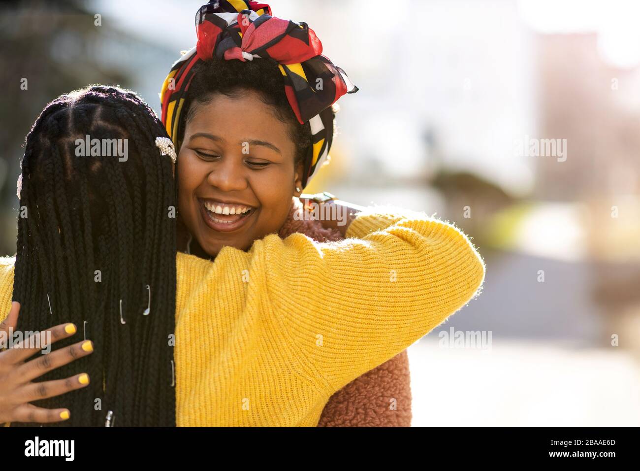 Two happy beautiful afro hi-res stock photography and images - Alamy