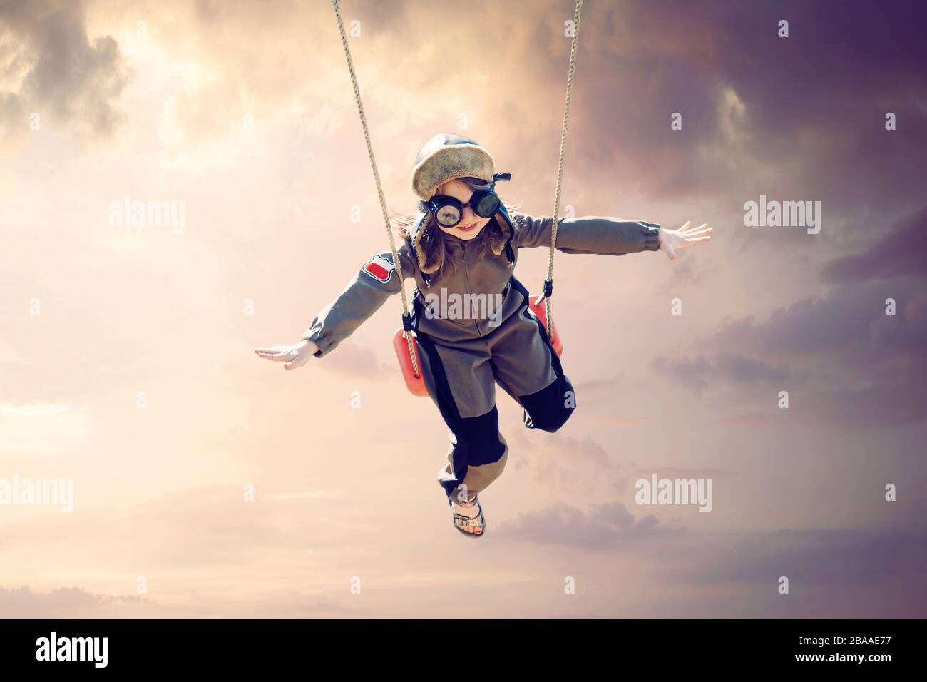 Little girl playing sky hi-res stock photography and images - Alamy