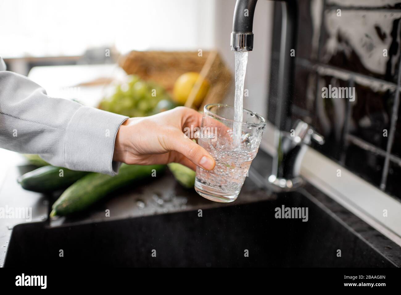 Glass tap water kitchen hi-res stock photography and images - Alamy