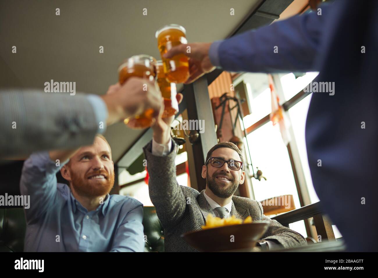 Males men looking after hi-res stock photography and images - Alamy