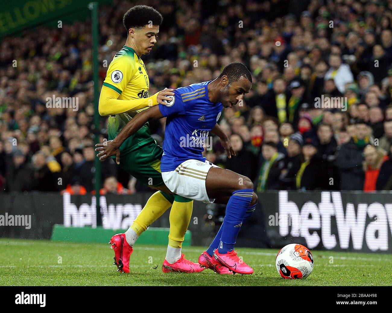 Norwich City's Jamal Lewis (left) and Leicester City's Ricardo Pereira ...