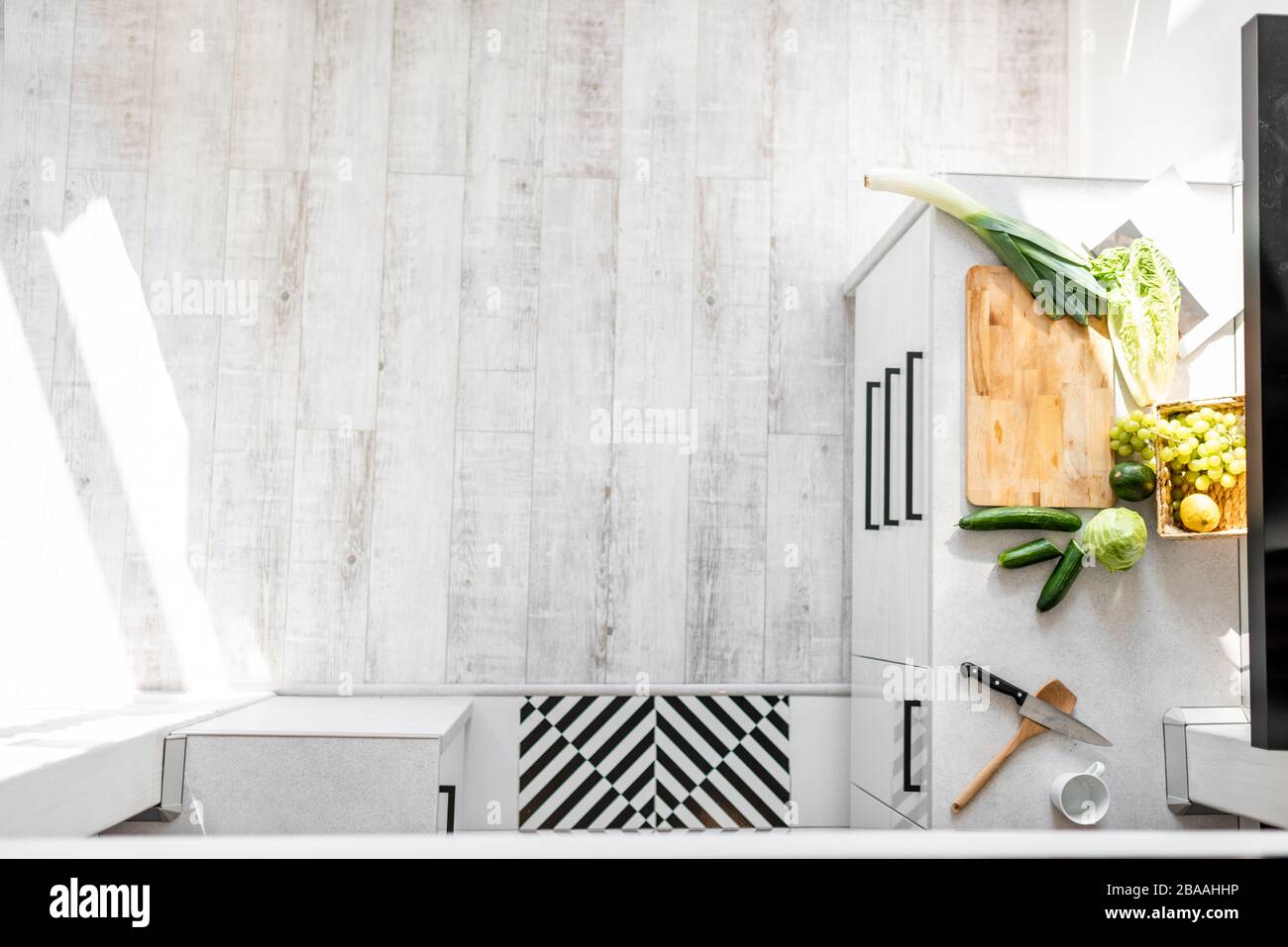 Top view on the modern kitchen with food ingredients on the table, view ...