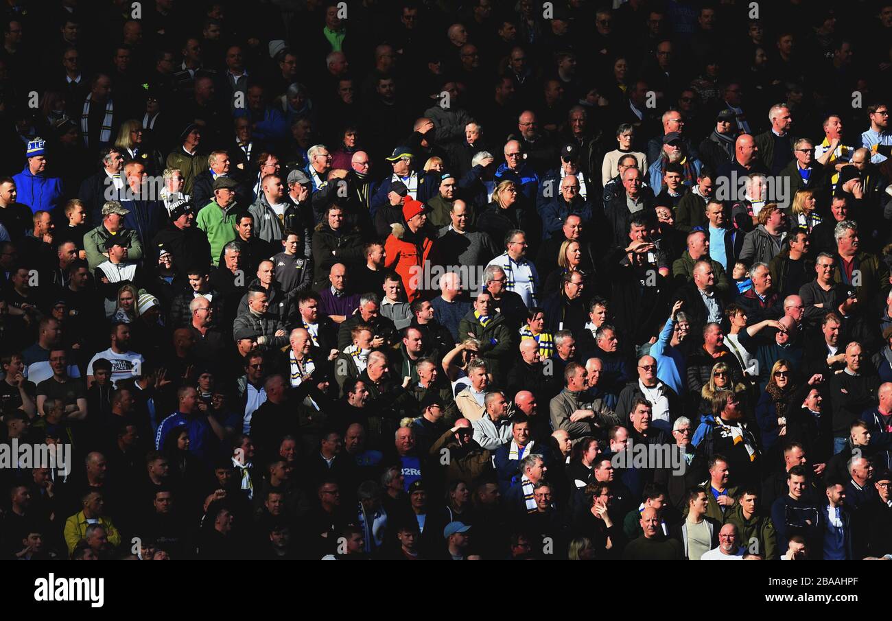 Fans in the stands in the sunshine Stock Photo - Alamy