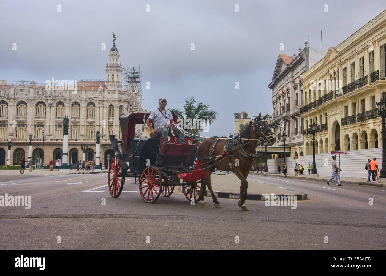 Horse carriage rides past the Capitolio building, Havana, Cuba Stock ...