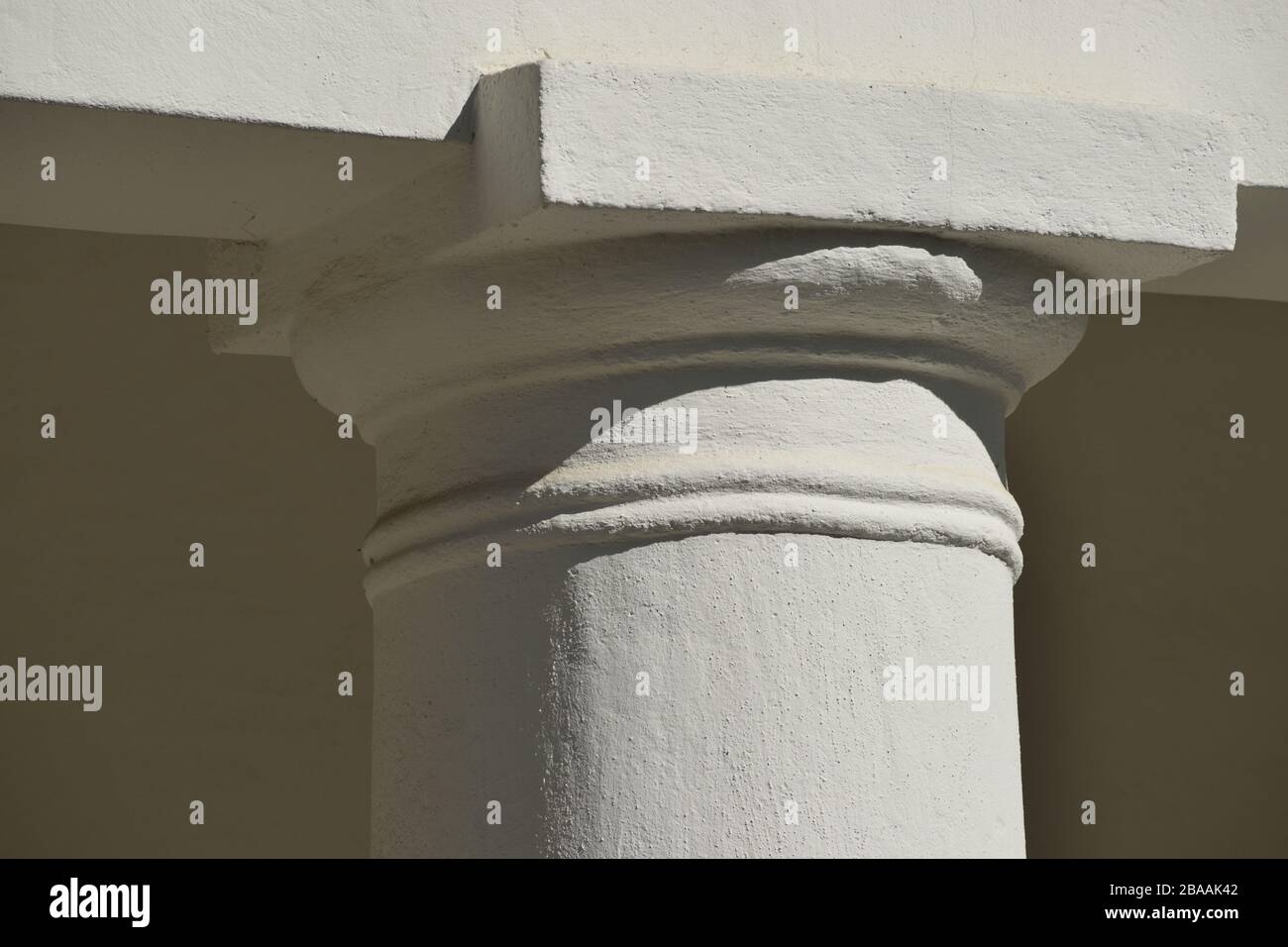 Top of the white column of a building Stock Photo - Alamy