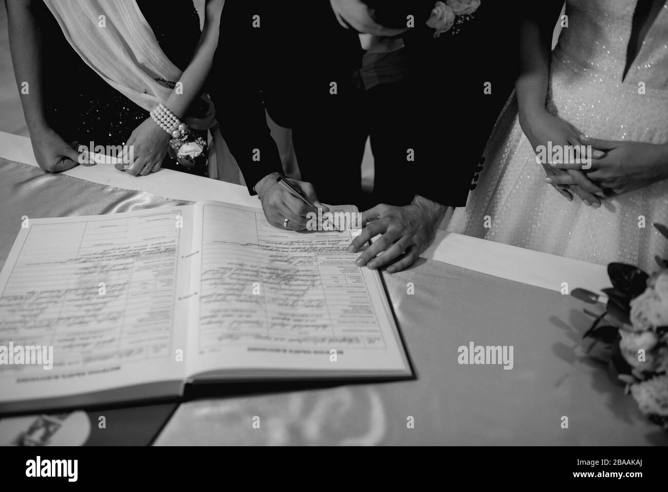 The bride and groom with their witness at the wedding Stock Photo - Alamy