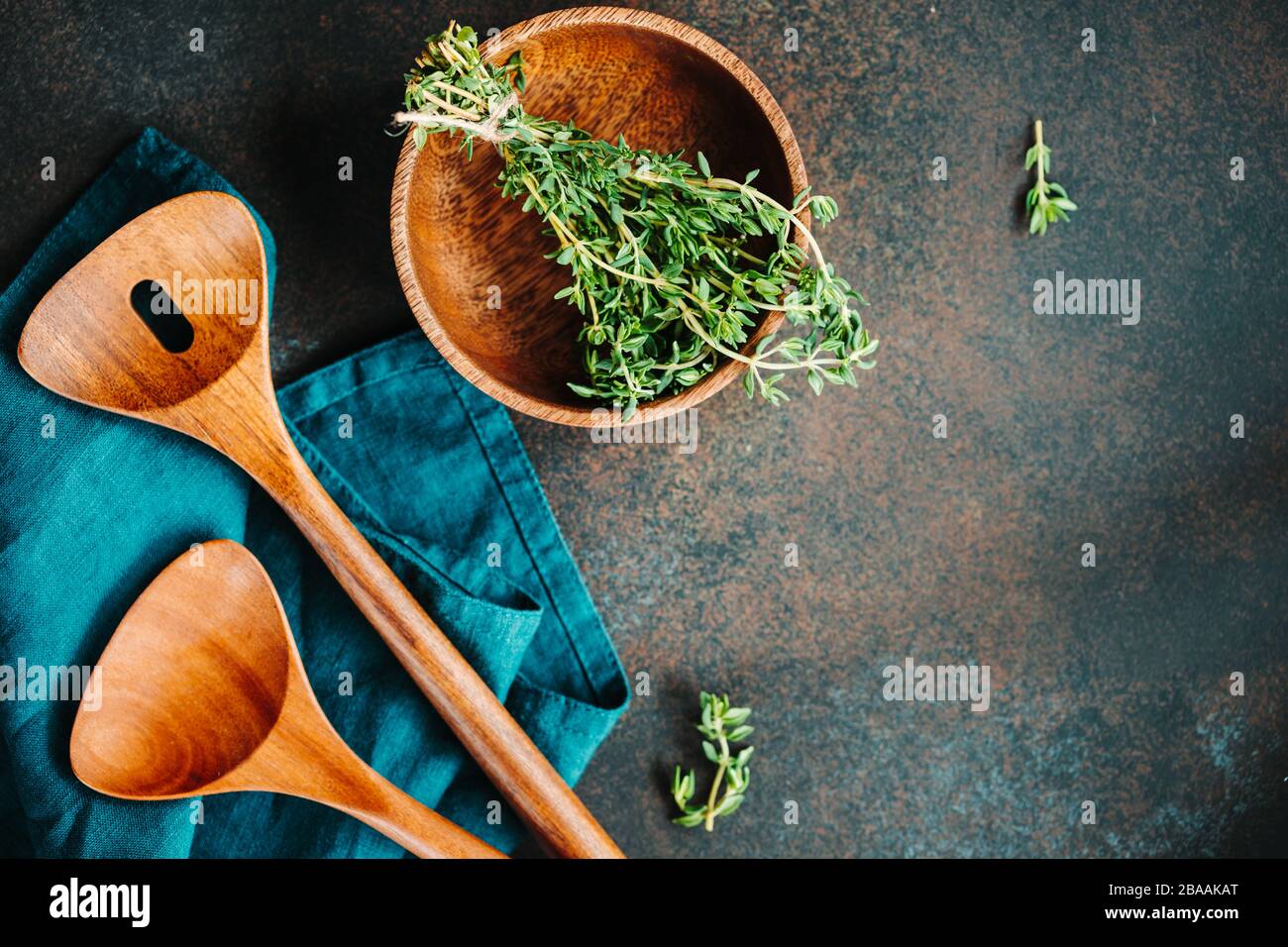Cooking table background. Wooden kitchen tools and bowl with fresh ...