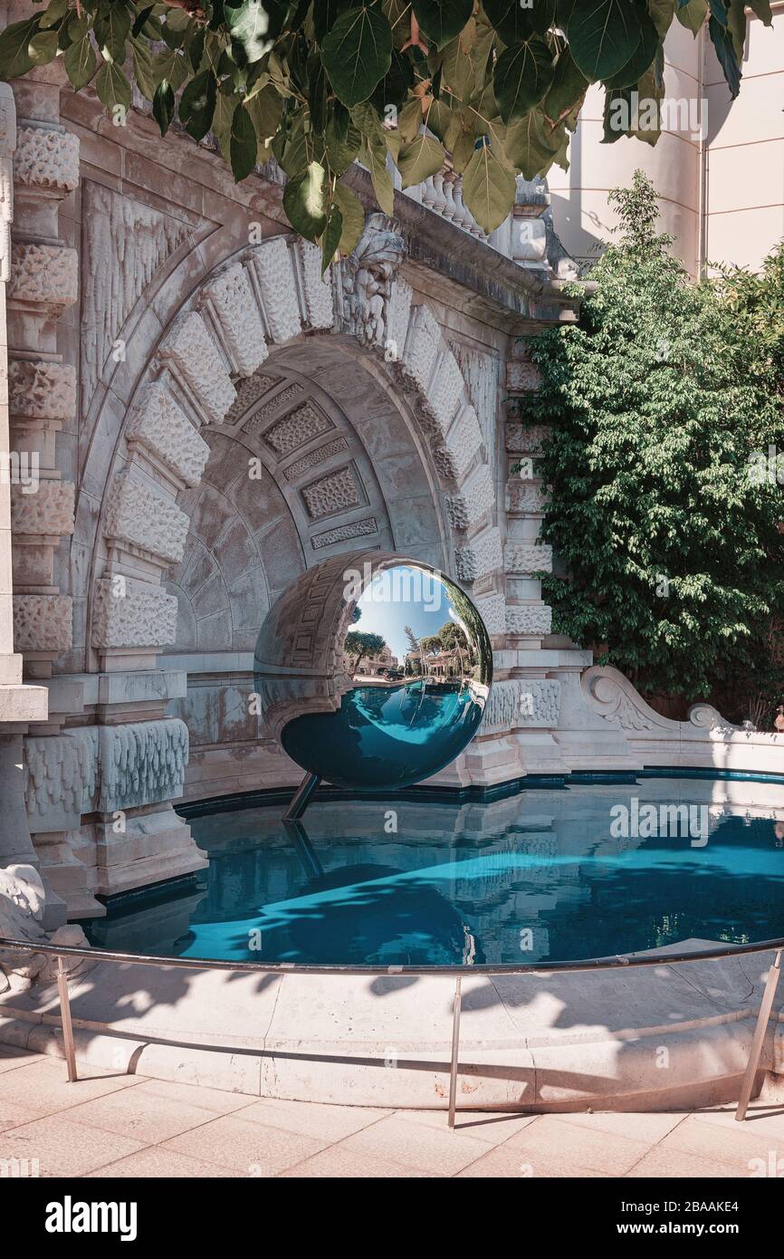 Mirror sphere in a pond in the garden near Monte Carlo Casino in Monaco ...