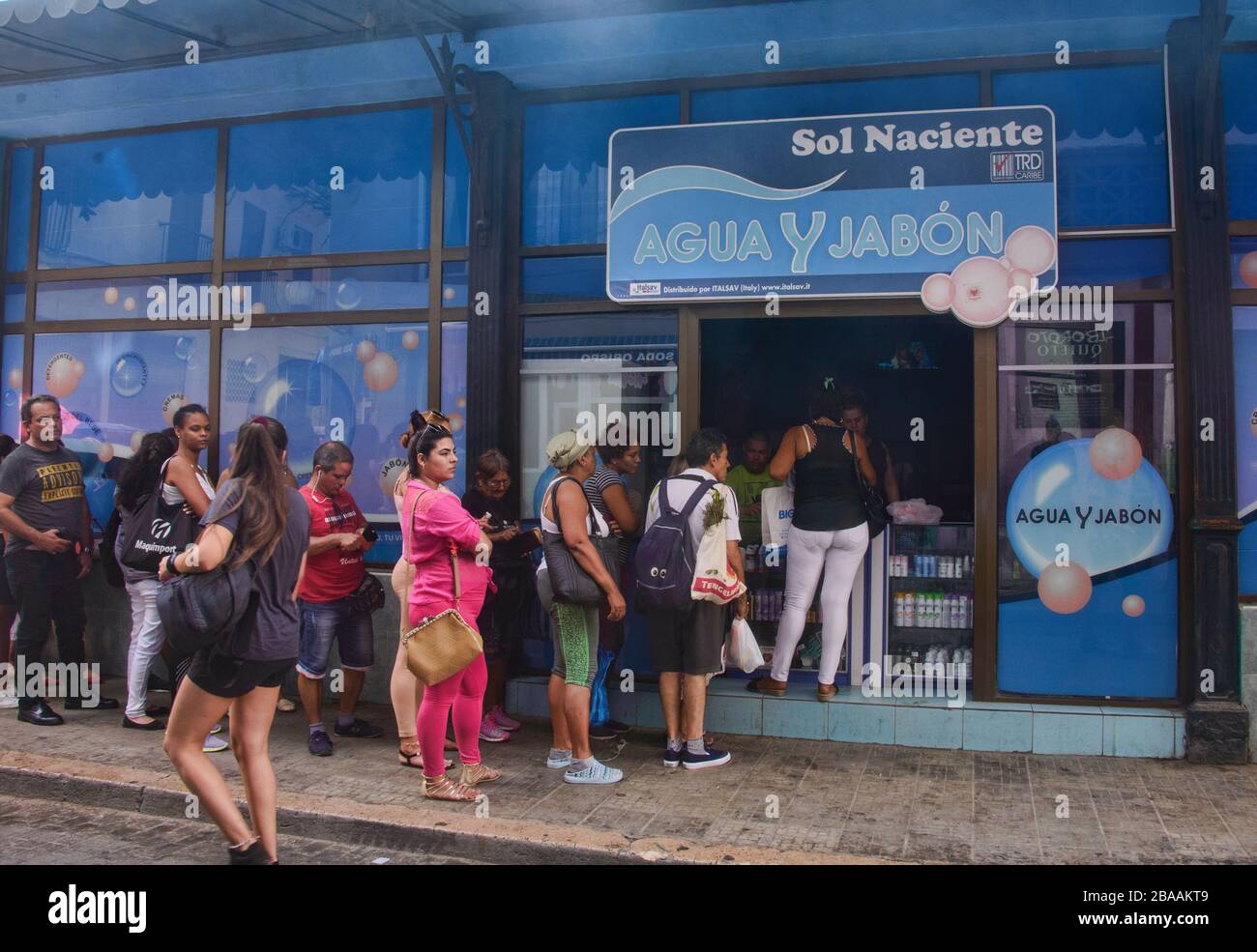 Cubans long line for water and soap, Havana, Cuba Stock Photo - Alamy