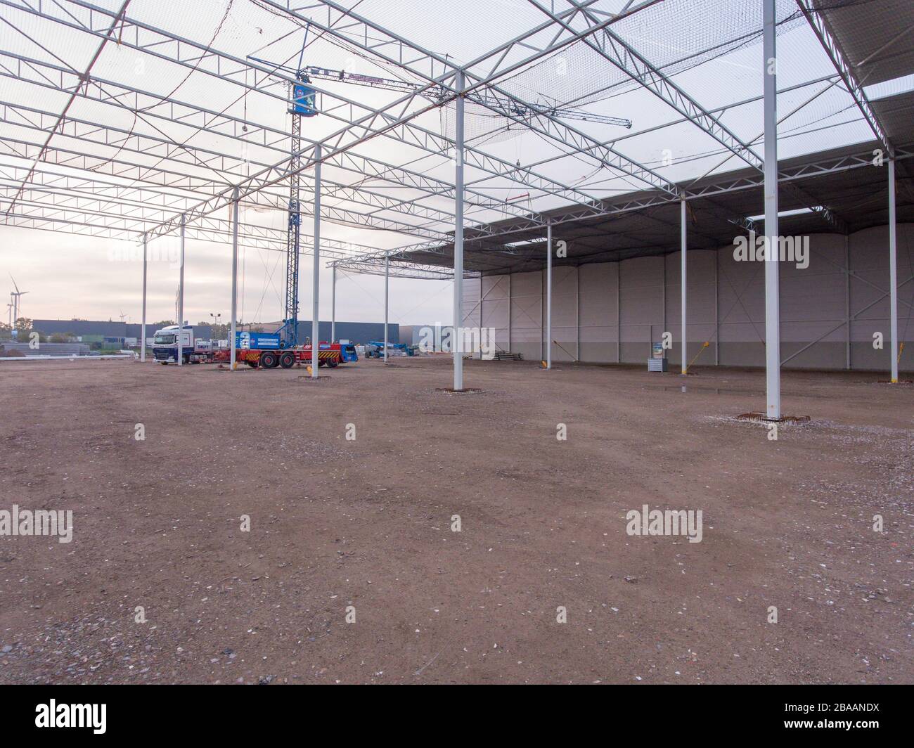 Warehouse in the construction process during daytime Stock Photo - Alamy