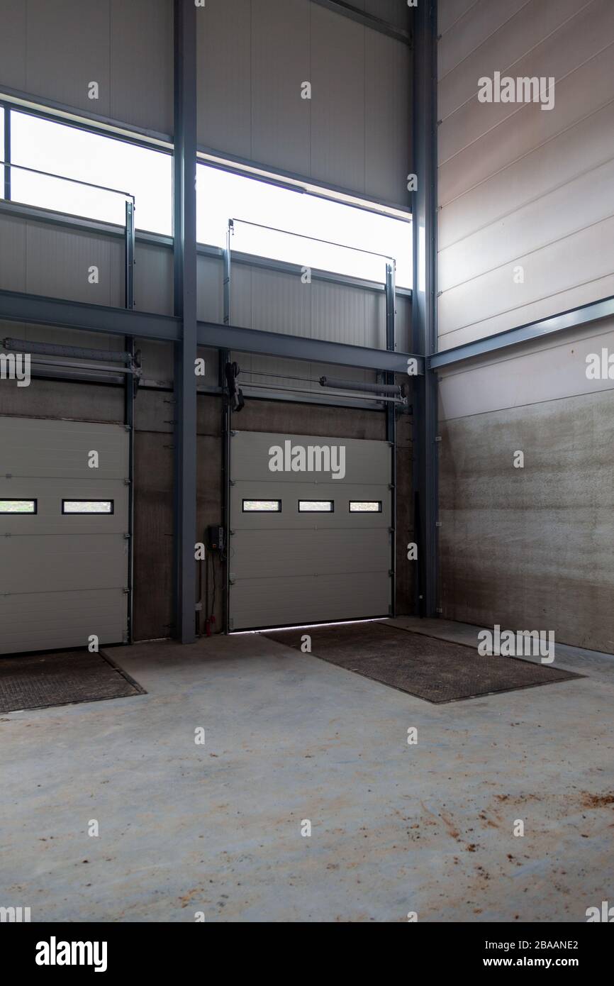 Vertical shot of the loading bays inside a warehouse Stock Photo - Alamy