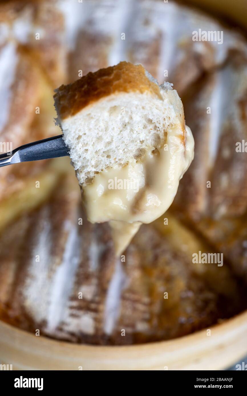 swiss cheese fondue with bread Stock Photo - Alamy