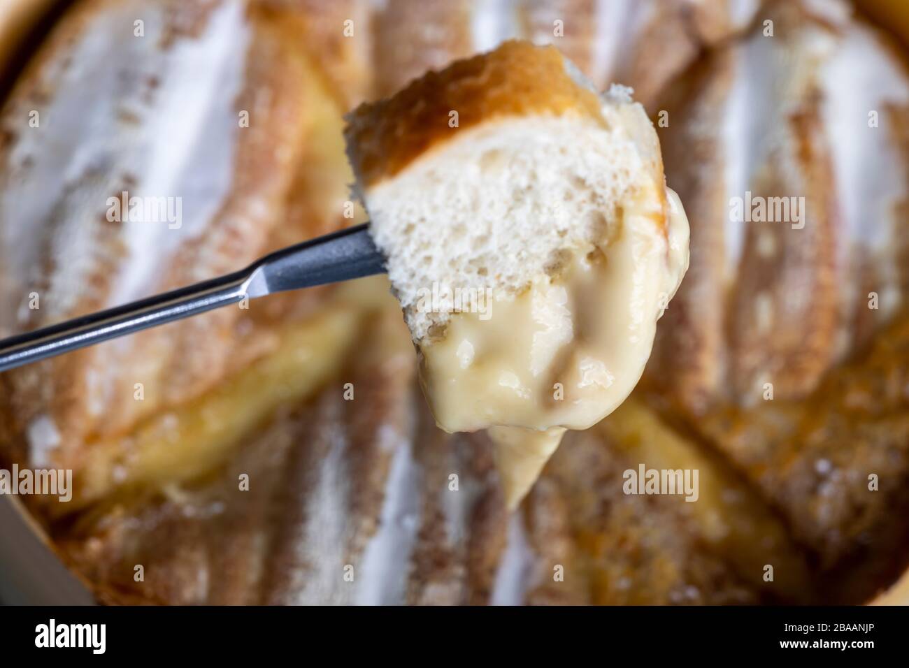 swiss cheese fondue with bread Stock Photo - Alamy