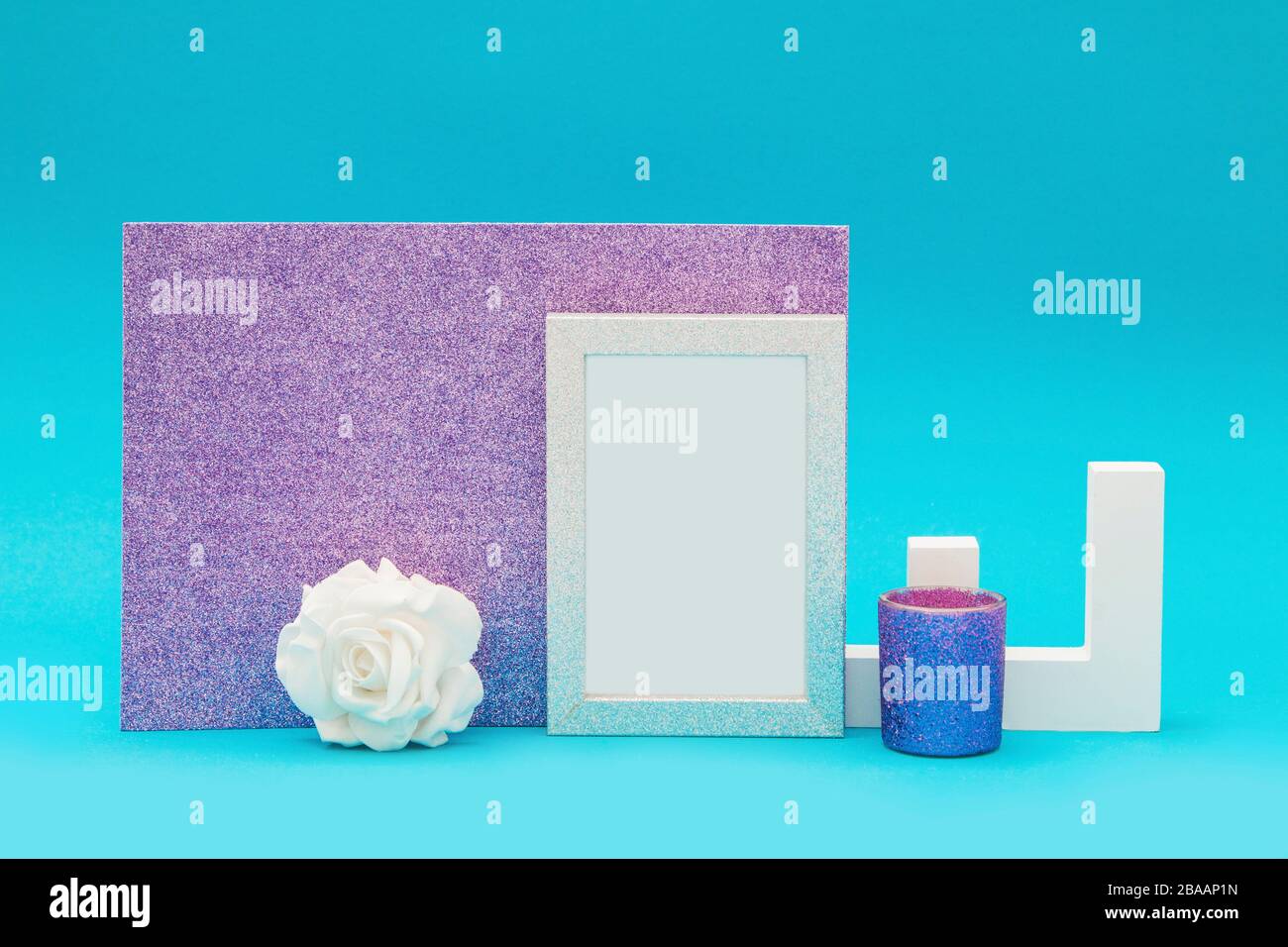 Shiny grey frame for text with details and decorations on a blue ...