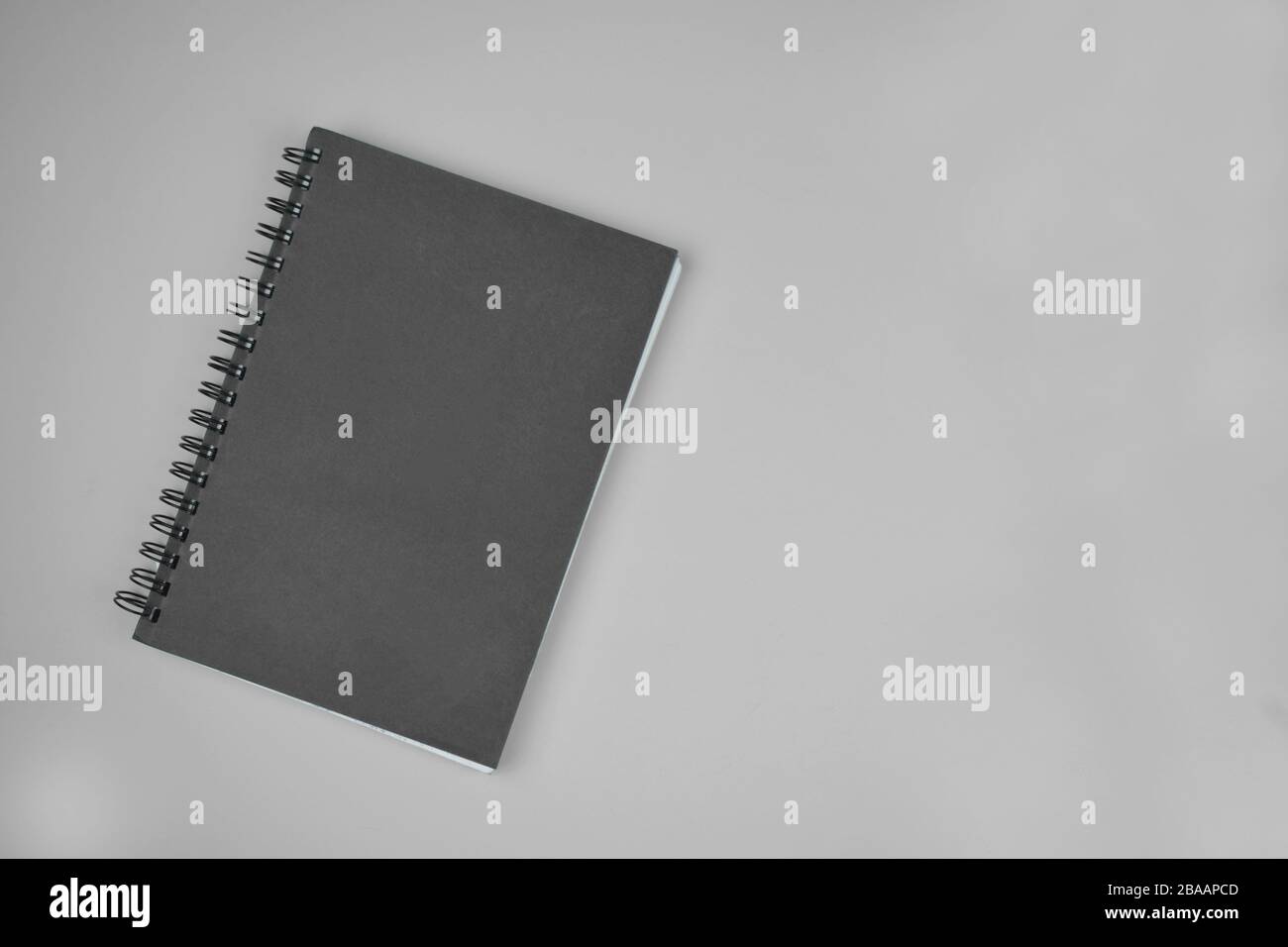 Black and white photograph of a simple writing diary over a simple ...