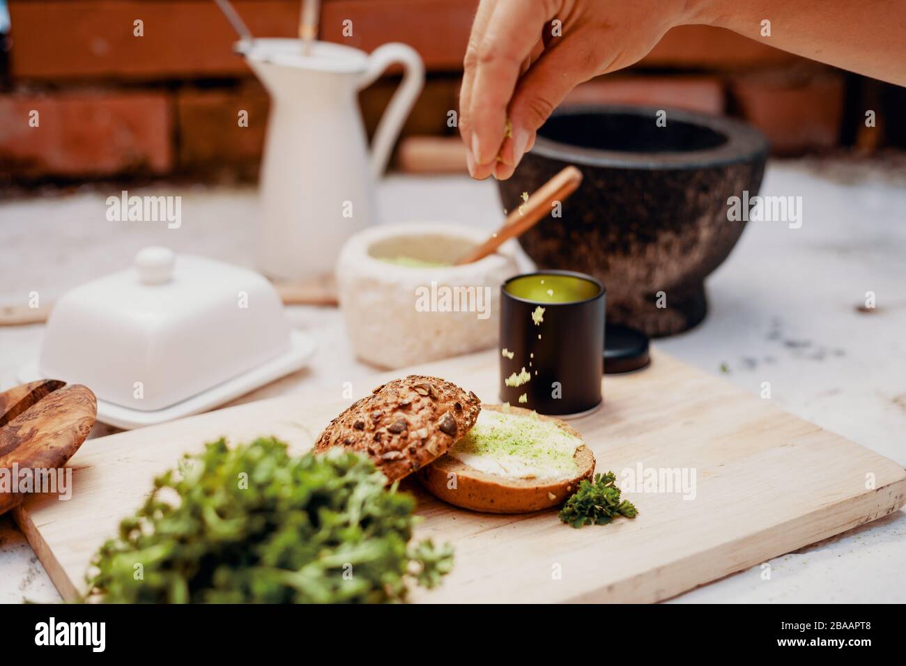 Production of parsley herb salt in a mortar Stock Photo - Alamy