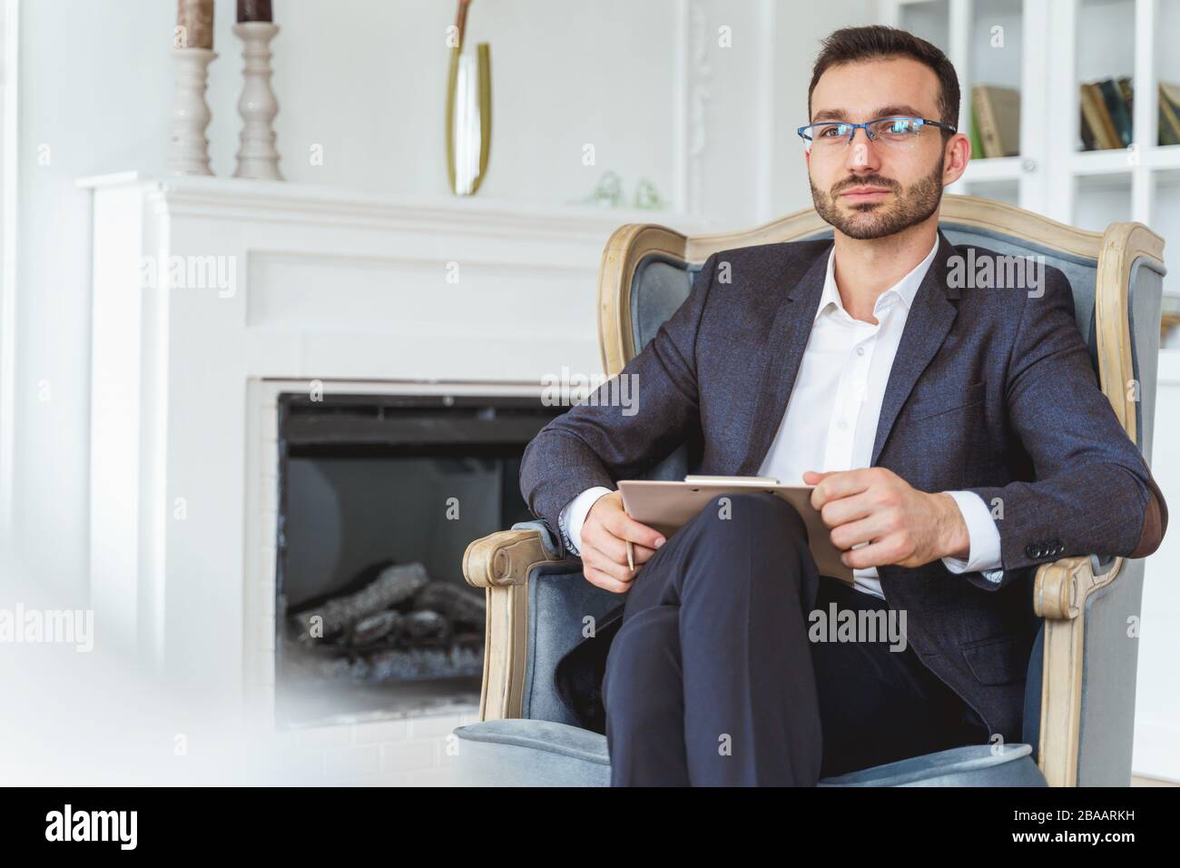 Handsome man looking in front of him Stock Photo - Alamy