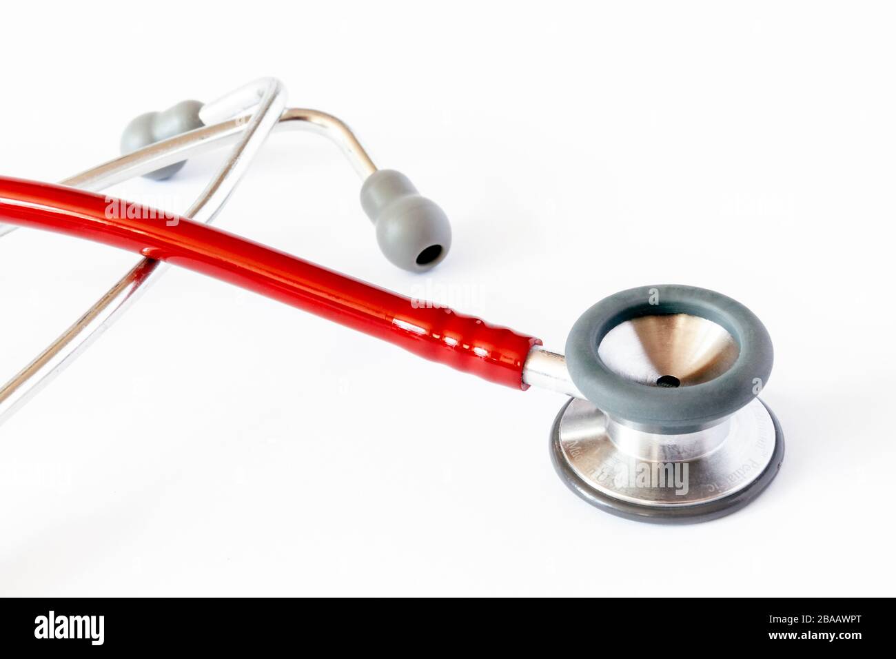 A red stethoscope isolated on a white background Stock Photo - Alamy